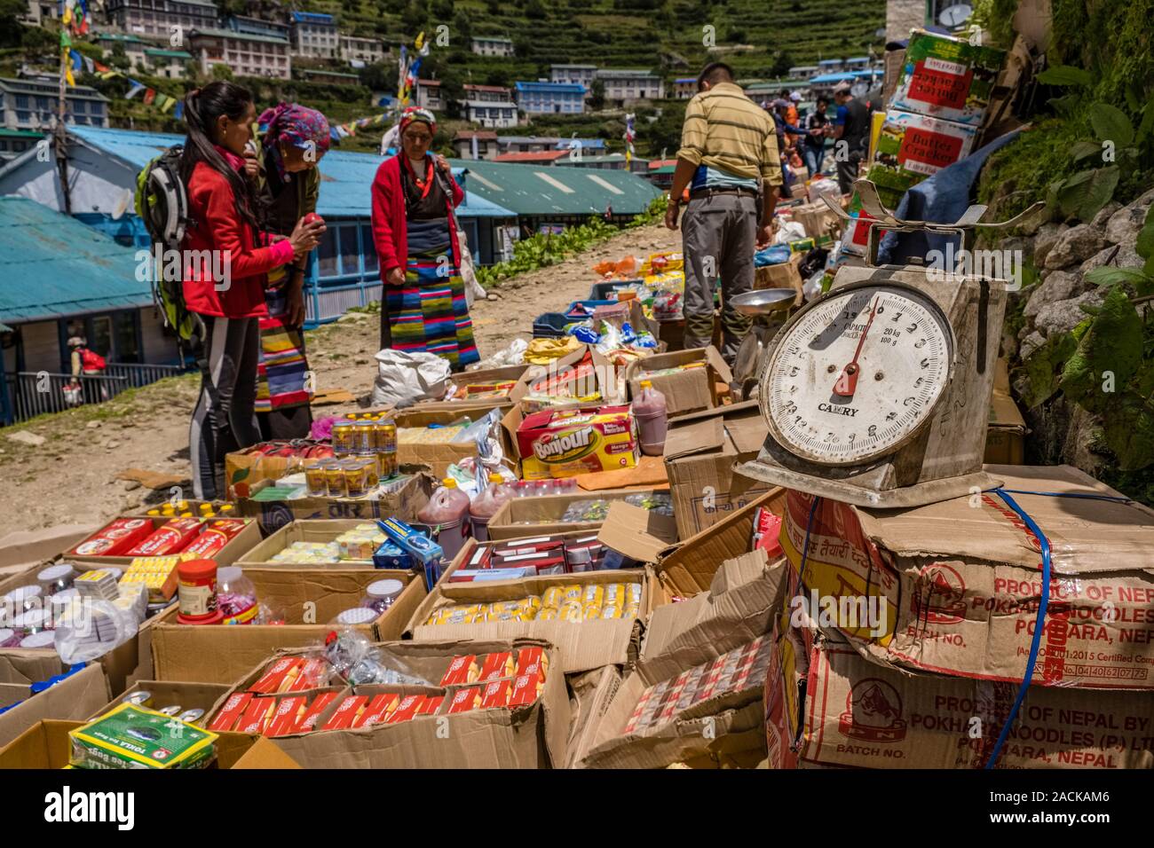 Many different goods are for sale at the weekly market in town Stock ...