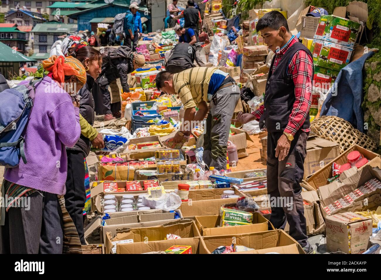 Many different goods are for sale at the weekly market in town Stock ...