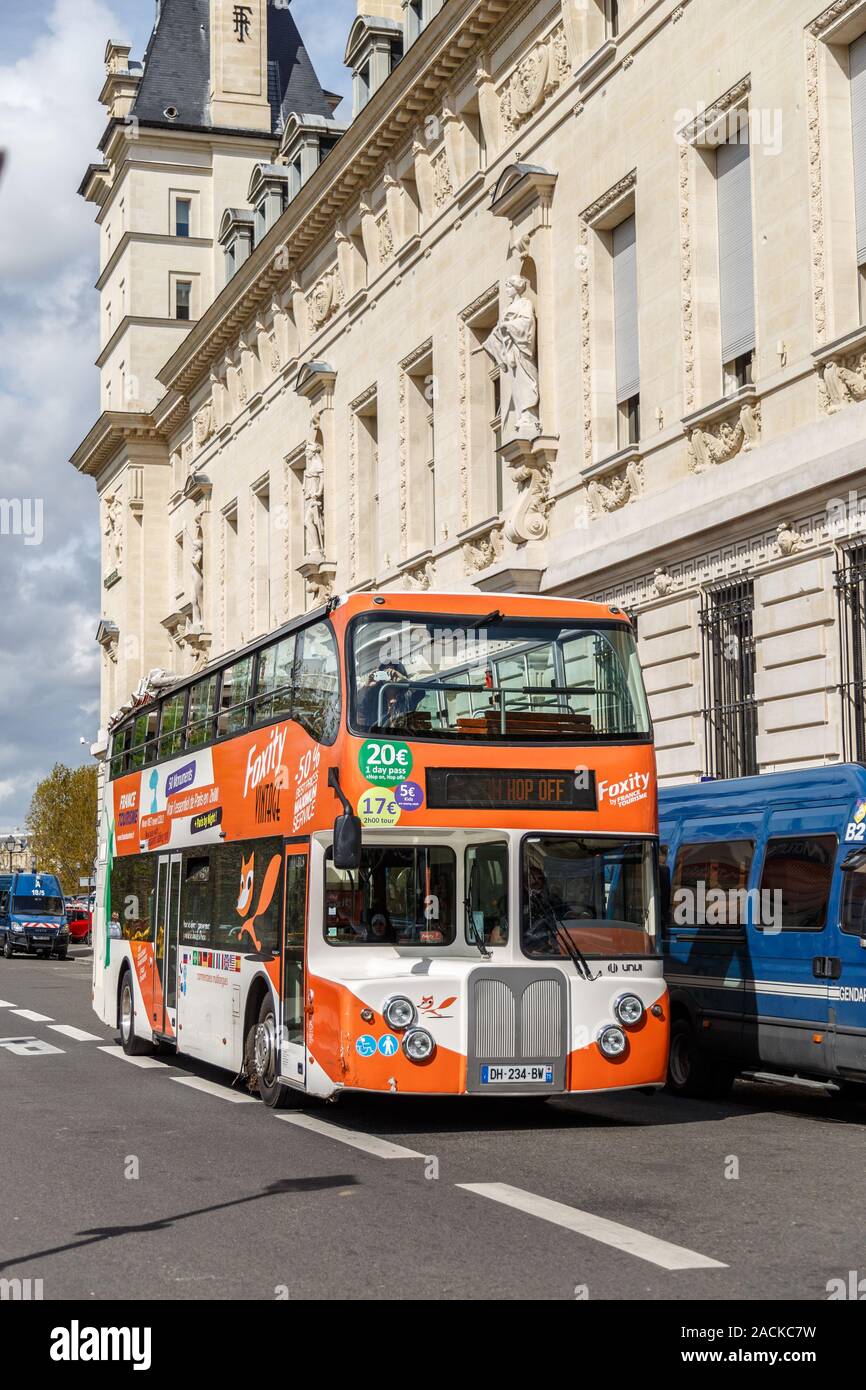 Paris, France, April 1, 2017: Tourists bus service, that shows the city ...