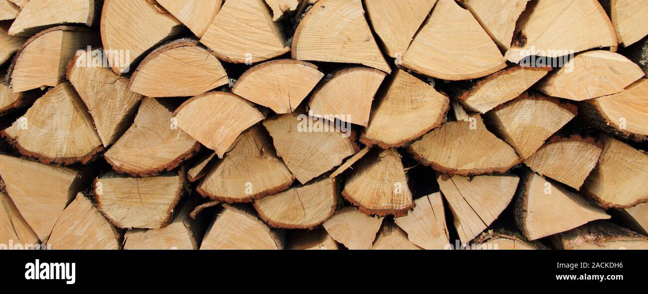 split dry firewood Stock Photo - Alamy