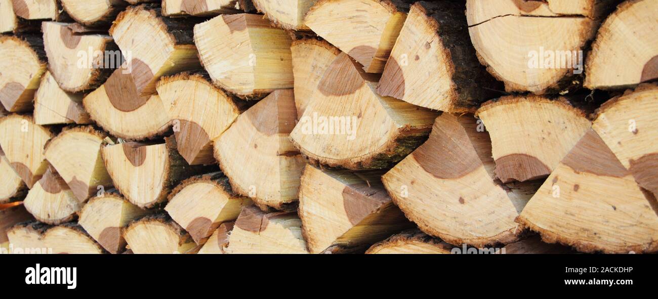 split dry firewood Stock Photo - Alamy