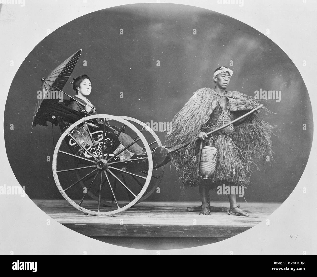 Japanese rickshaw. Woman in a jinrikisha (Japanese rickshaw) in Japan ...