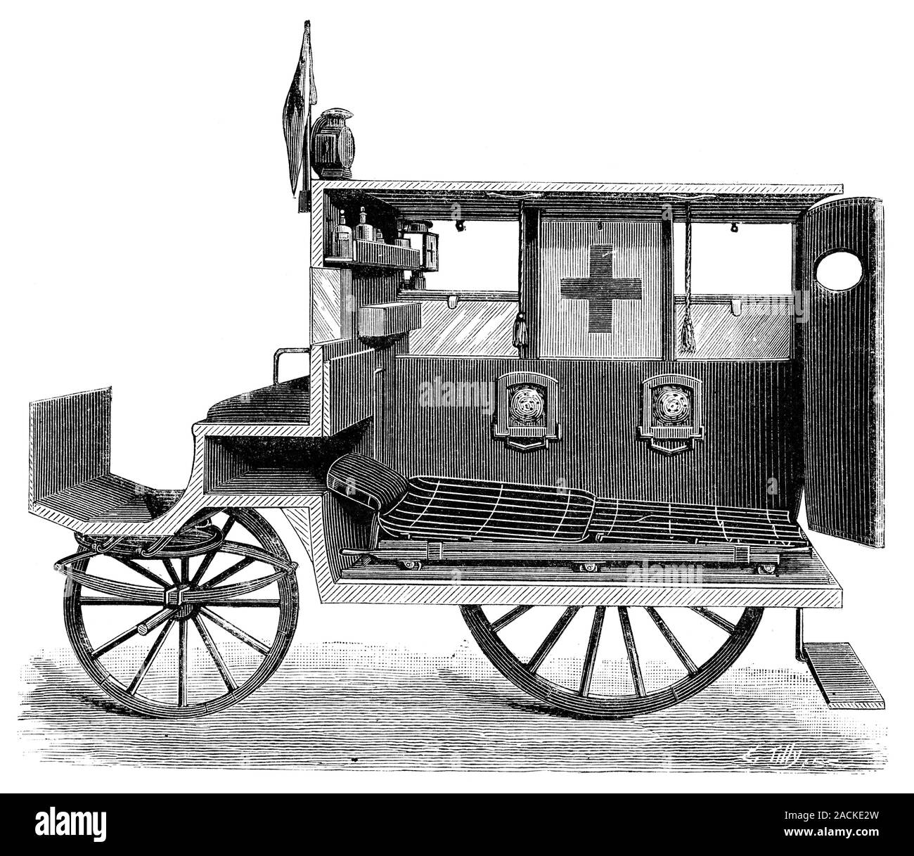 City ambulance, shown in cutaway form to reveal its interior with a ...