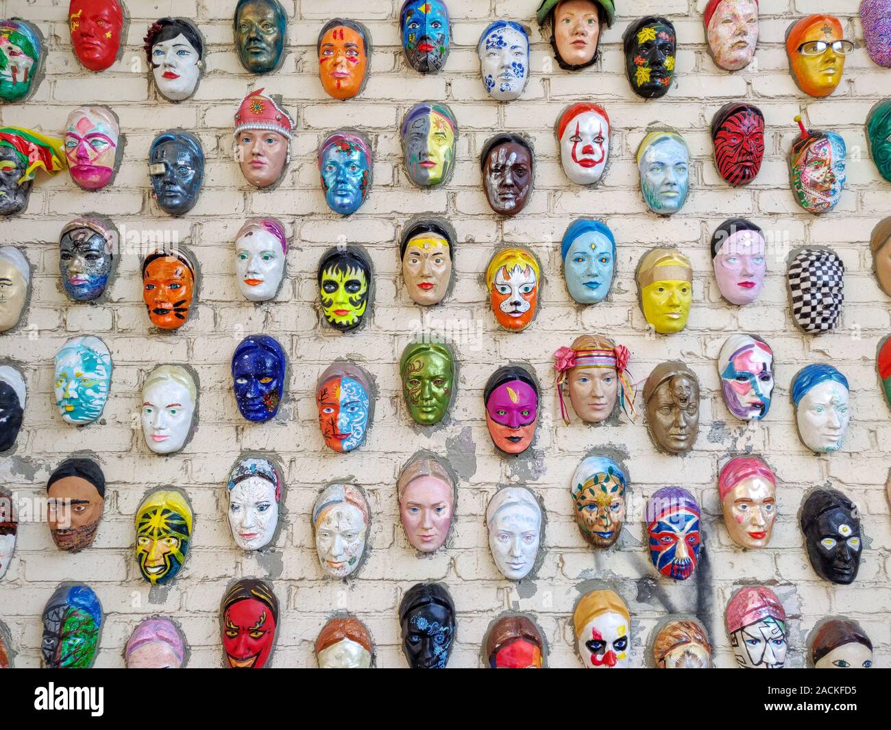 Moscow, Russia, 21 October 2019: Colorful painted ceramic faces ...