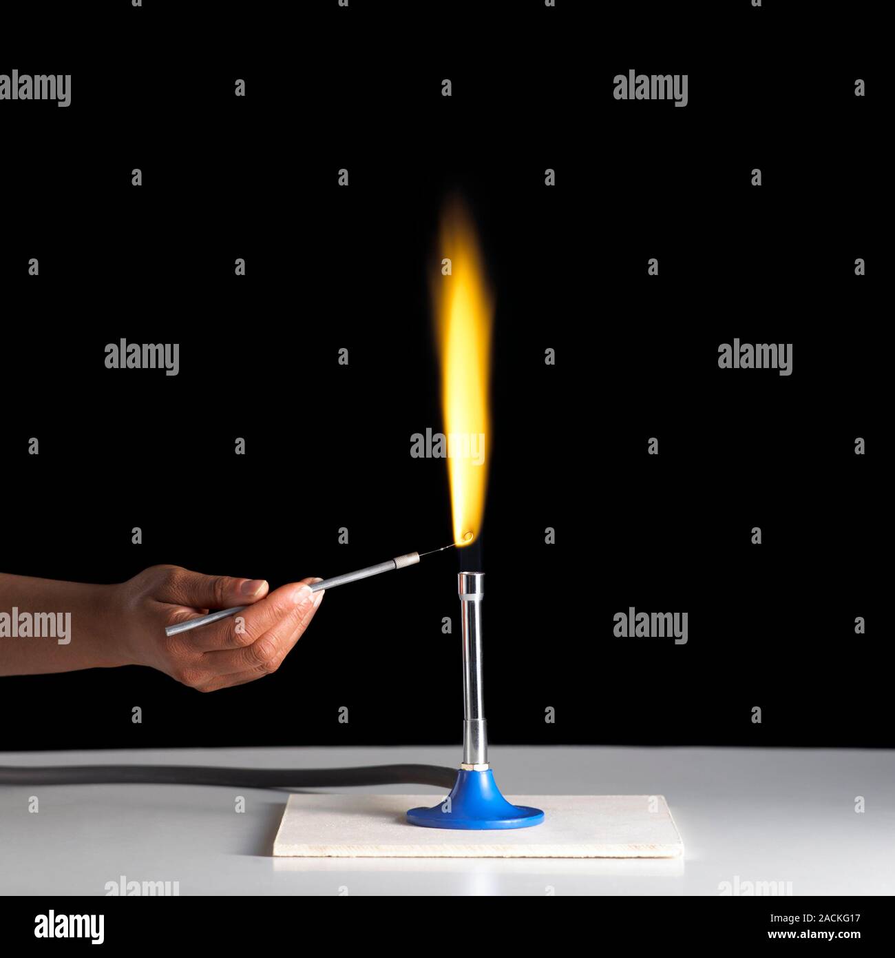 Sodium flame test. Positive result of a flame test for sodium (Na ...