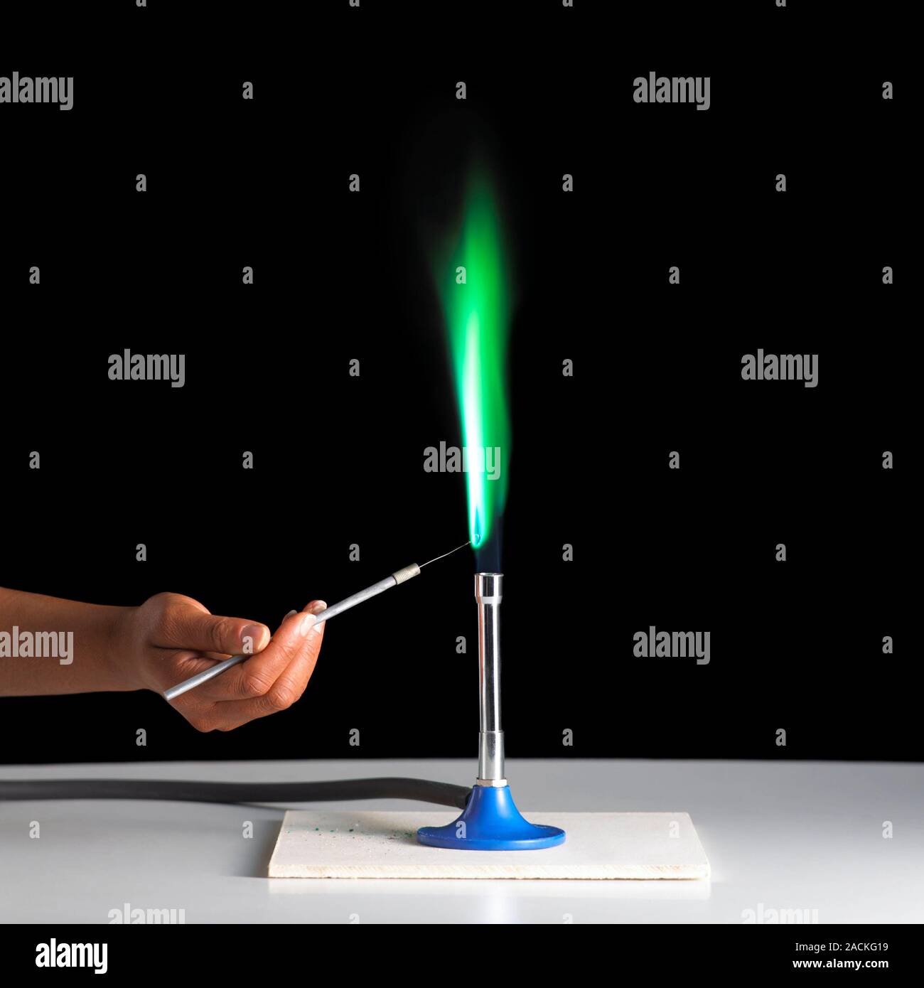 Copper flame test. Positive result of a flame test for copper (Cu ...