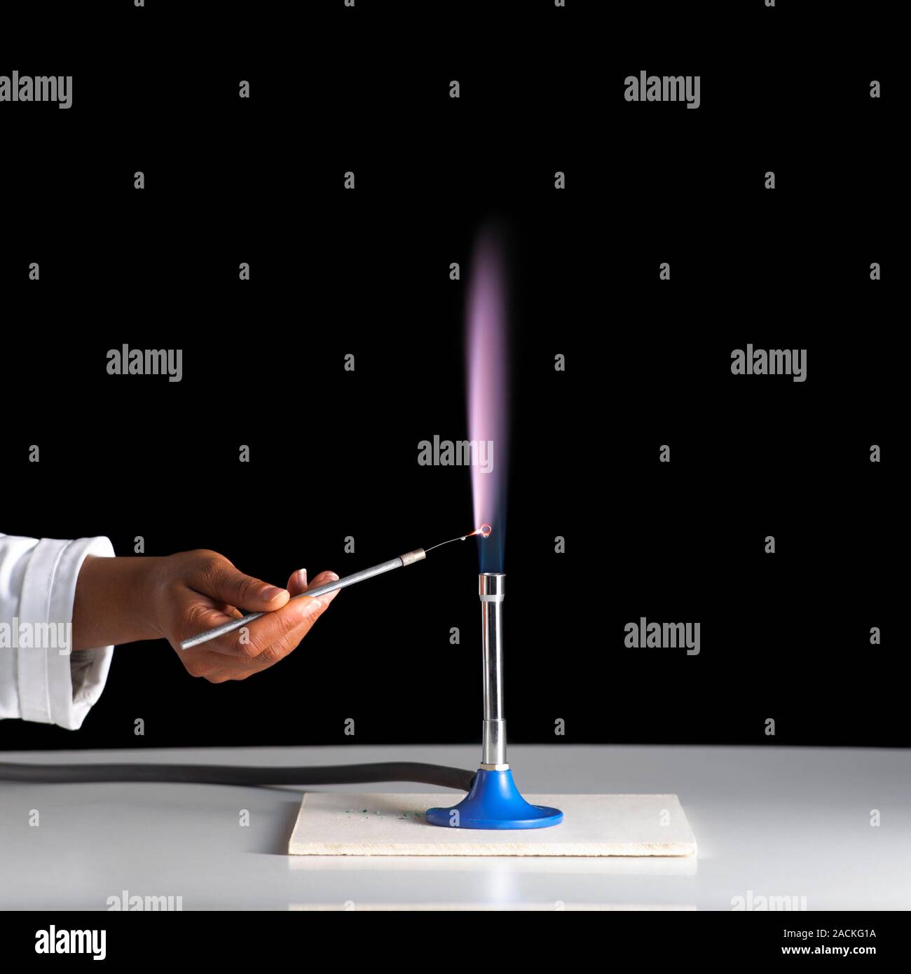 Potassium flame test. Positive result of a flame test for potassium (K ...