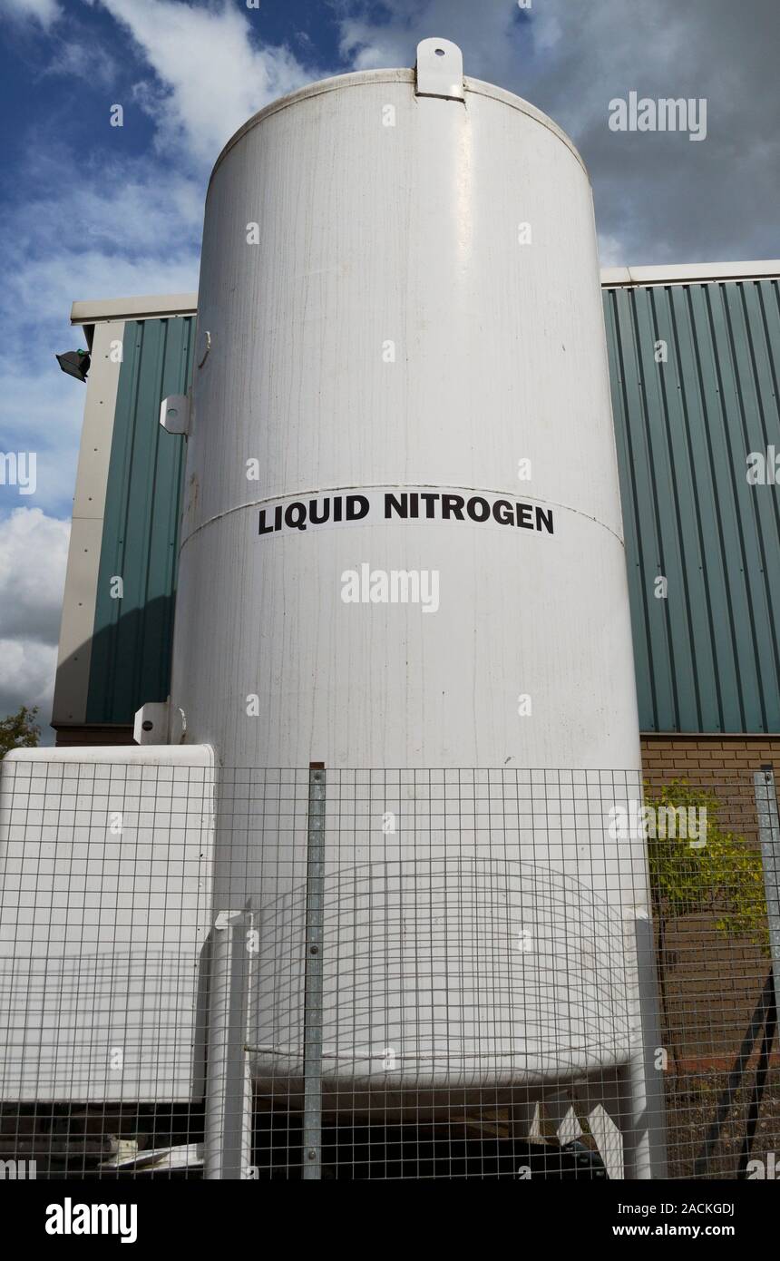 Liquefied nitrogen storage tank on industrial estate. Nitrogen is ...