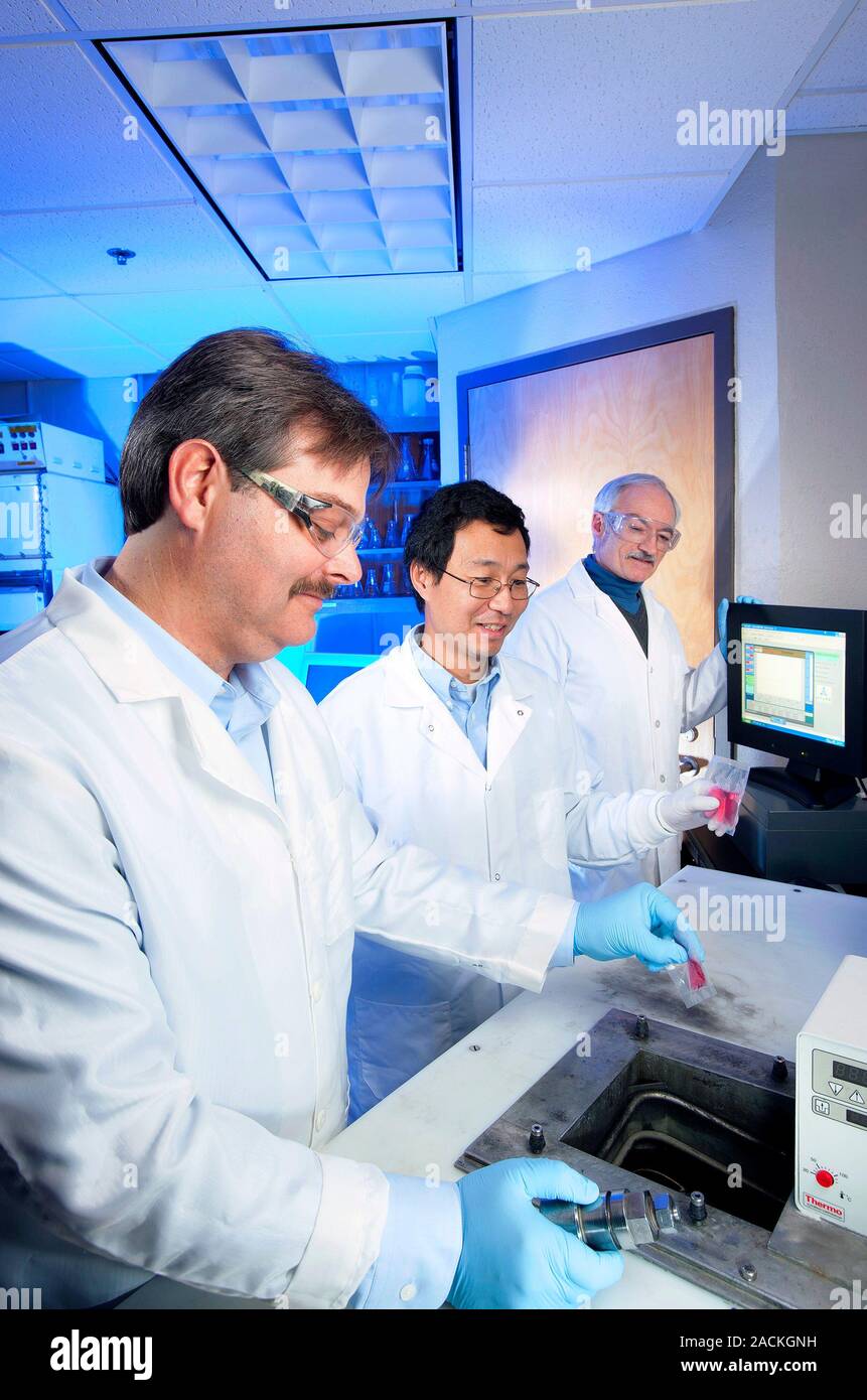 Virology lab. Molecular biologists performing high-pressure processing ...