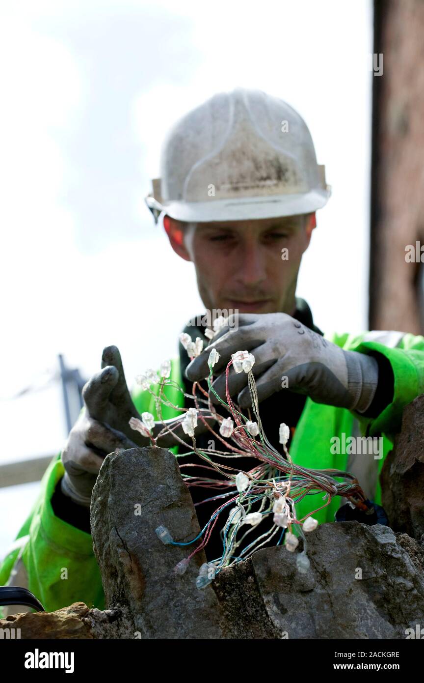 Repairing telephone lines. Telephone engineer repairing domestic ...