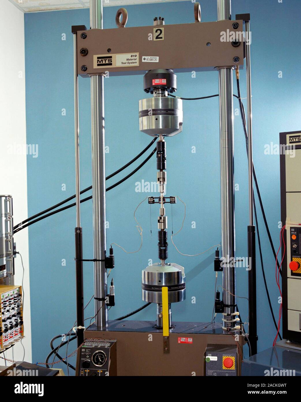 Tensile specimen in an MTS testing machine. Aluminium alloy (2219 ...