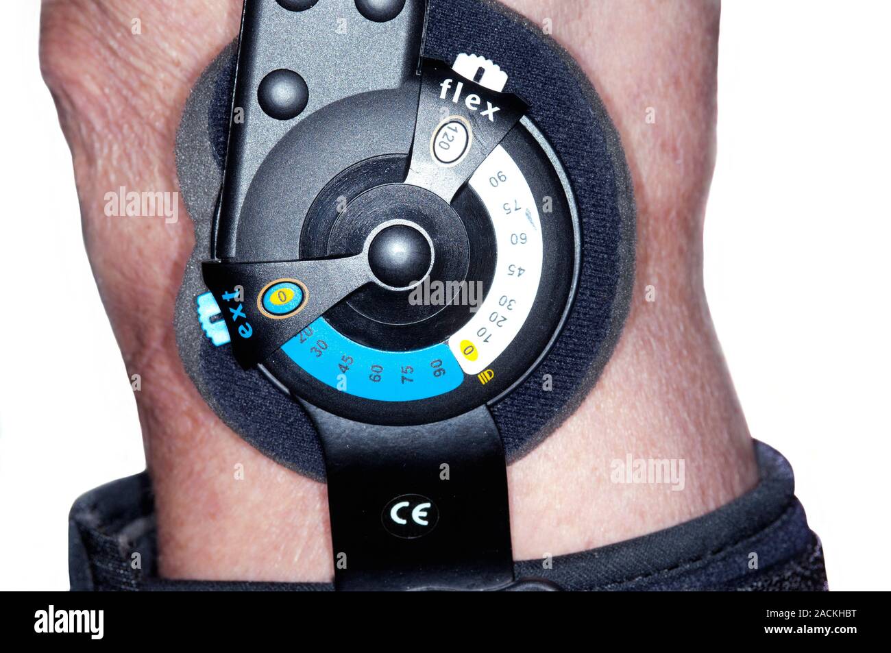 Knee brace fitted to the knee joint in a 76 year old female patient ...