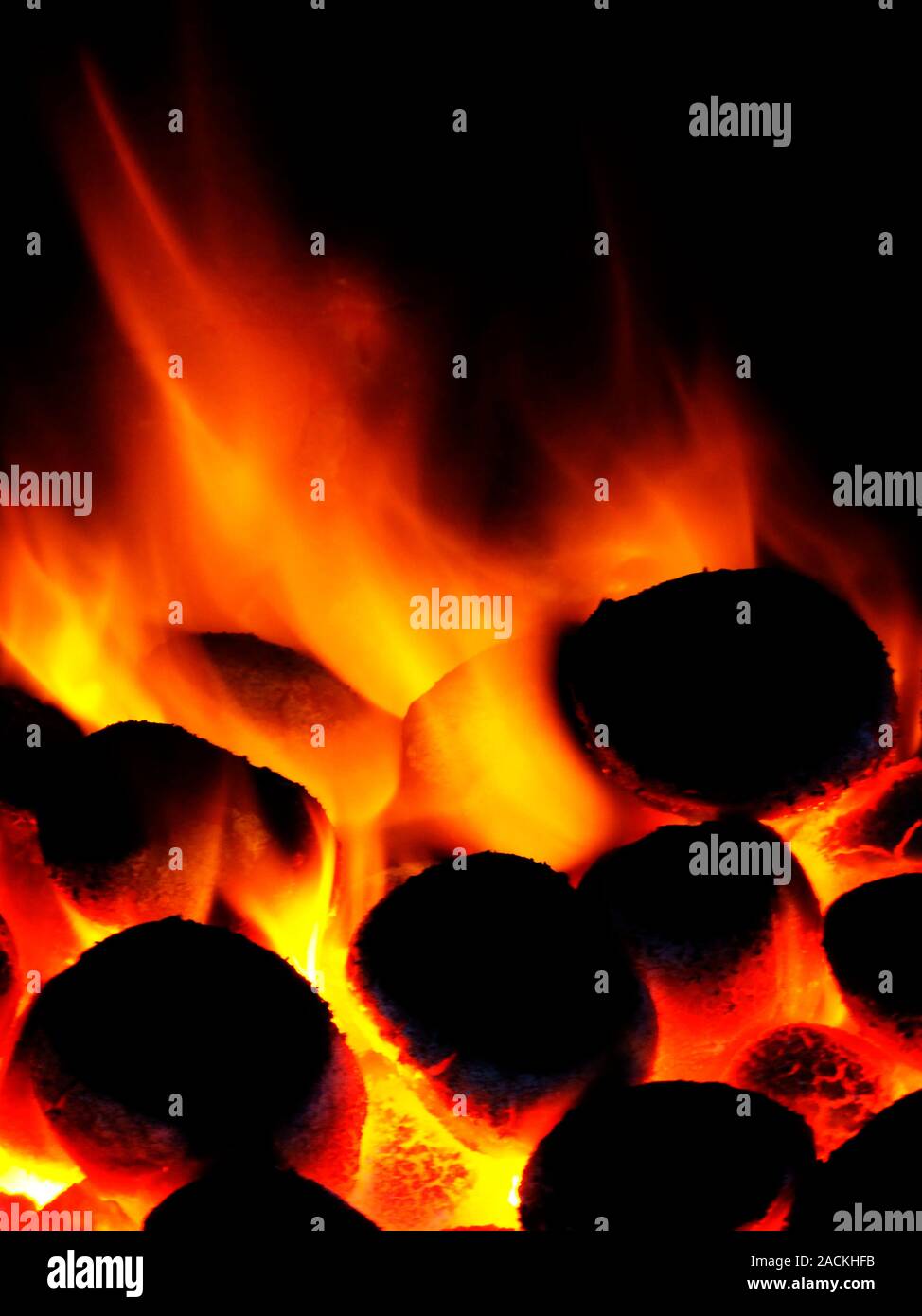 Smoke-free coal burning on a home fire. This is coal which has been ...