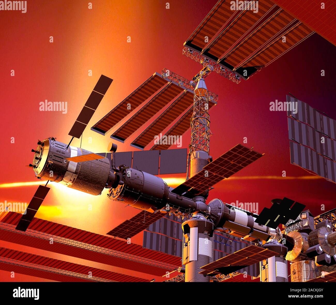 Automated Transfer Vehicle (ATV, left) at sunrise, docked to the ...