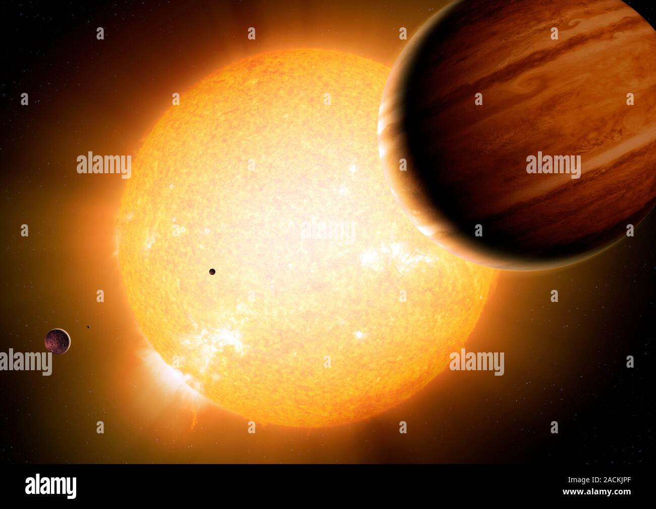 Alien planetary system. Computer artwork of a star (centre) and its ...