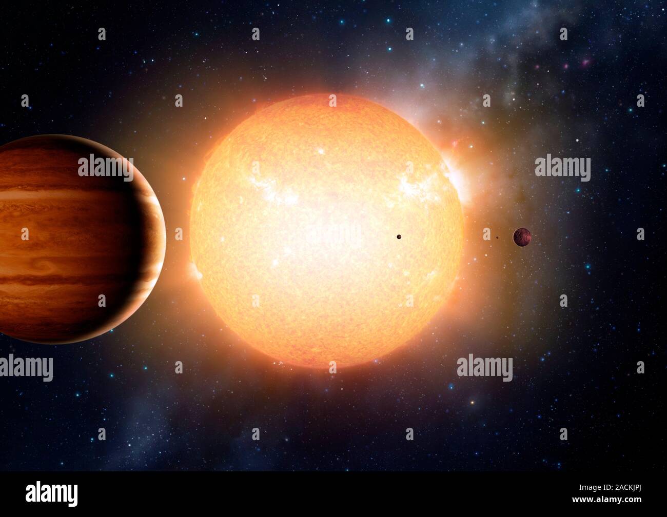 Alien planetary system. Computer artwork of a star (centre) and its ...