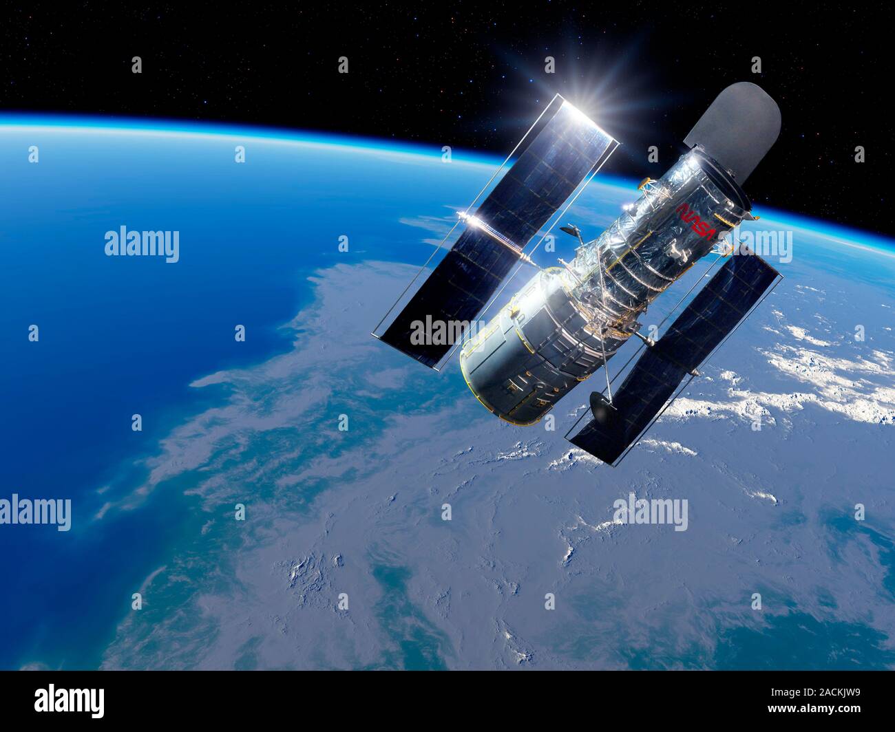 Hubble Space Telescope (HST) in orbit over the Earth, artwork. The HST ...