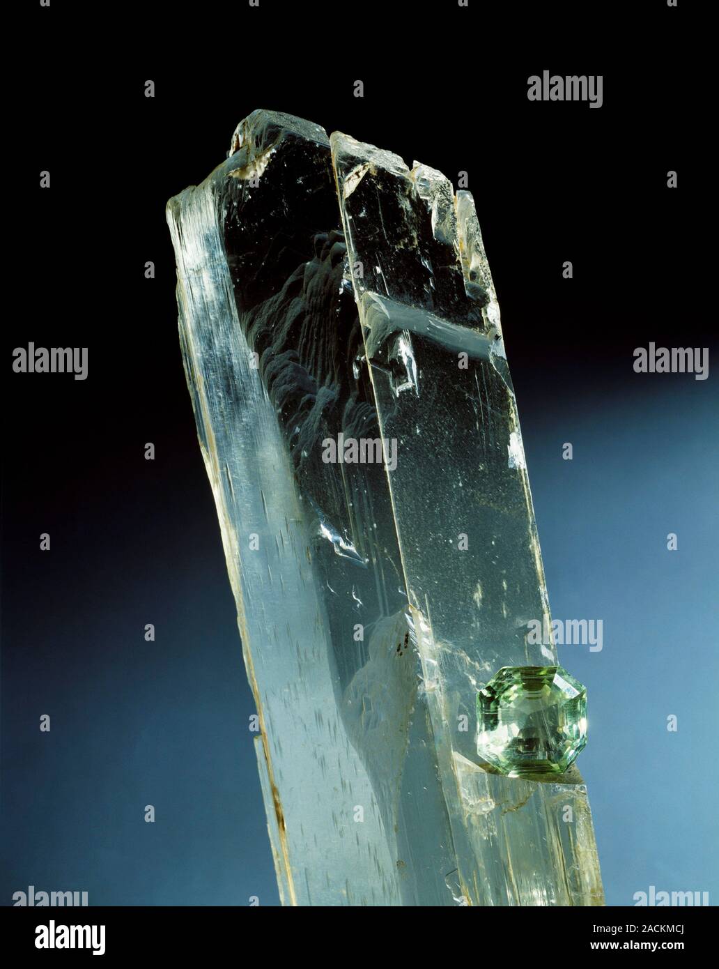 Spodumene crystal and cut stone. Large spodumene crystal and cut ...