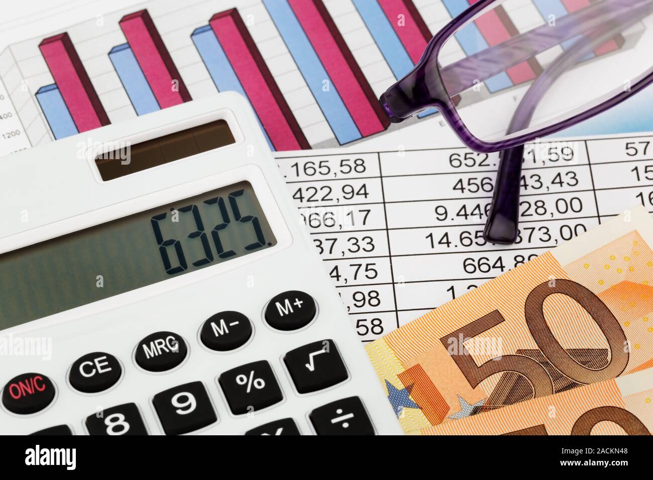 Calculators and Key Figures Stock Photo - Alamy