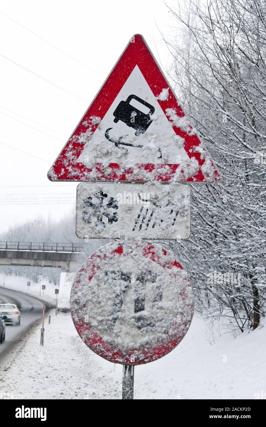 Snowy traffic sign Stock Photo - Alamy
