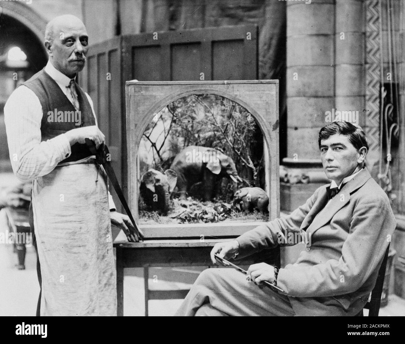 Guy Dollman (1886â 1942, seated), British zoologist, with a small-scale ...