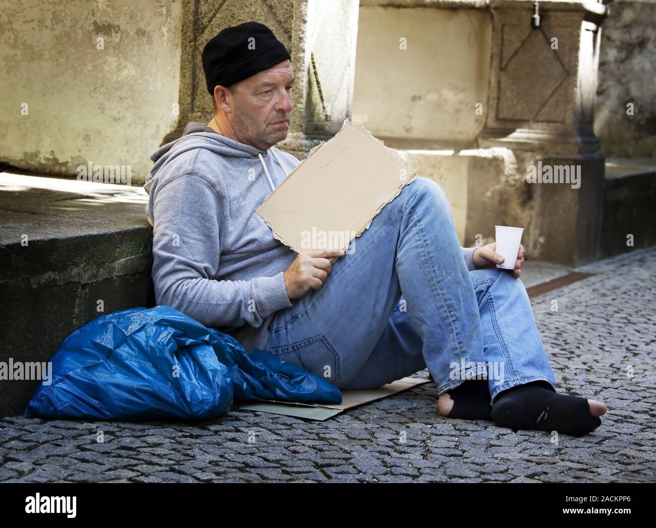 Homeless unemployed hi-res stock photography and images - Alamy