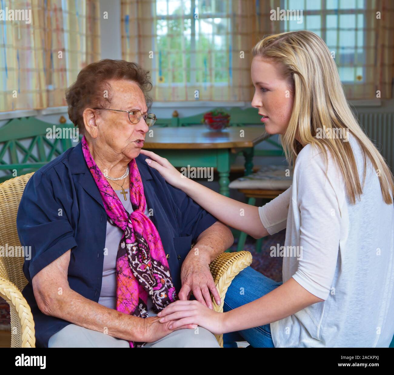 Grandchild visits grandmother hi-res stock photography and images - Alamy