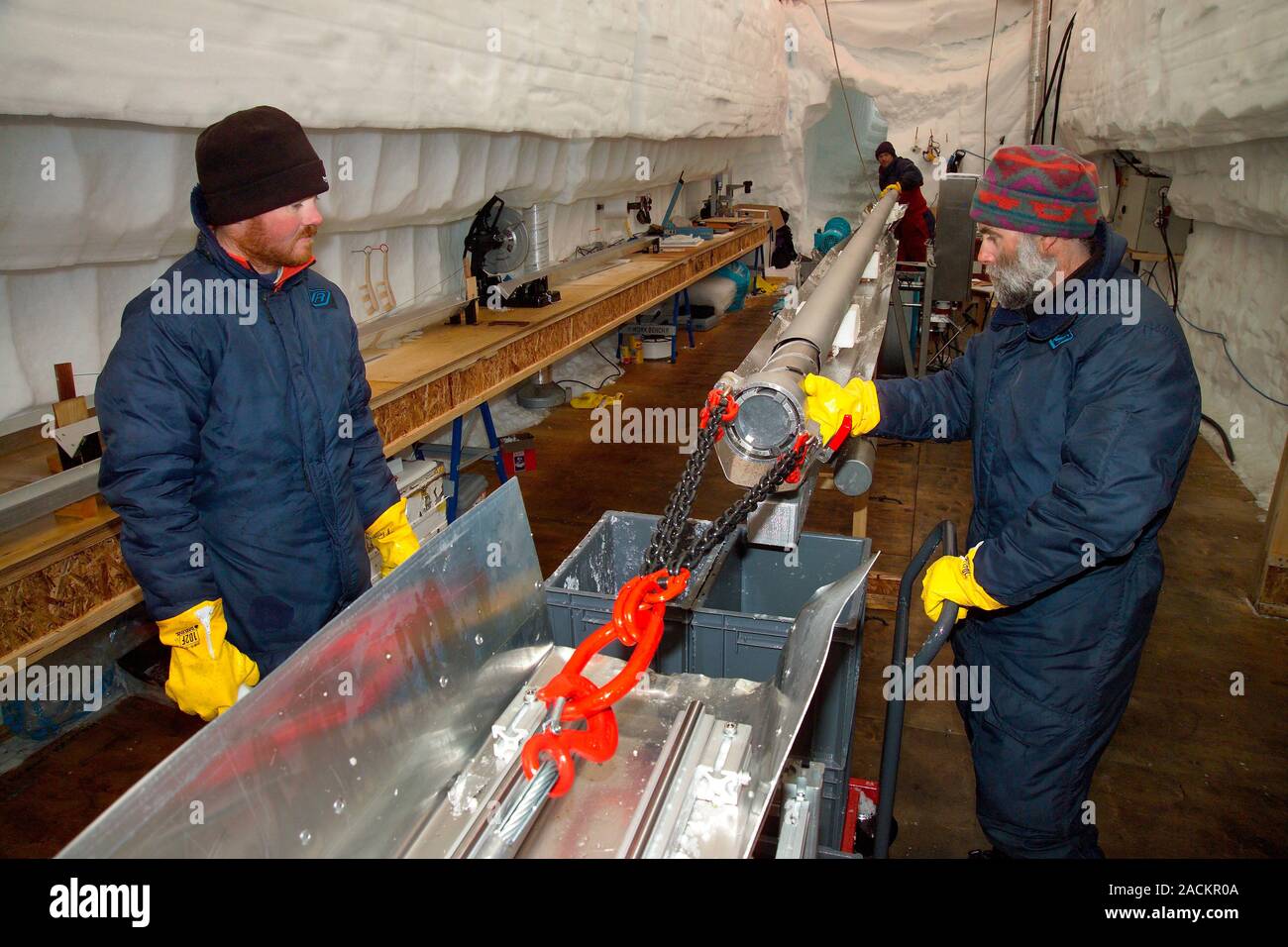 Antarctic research station. Scientists at an ice-core drilling site on ...