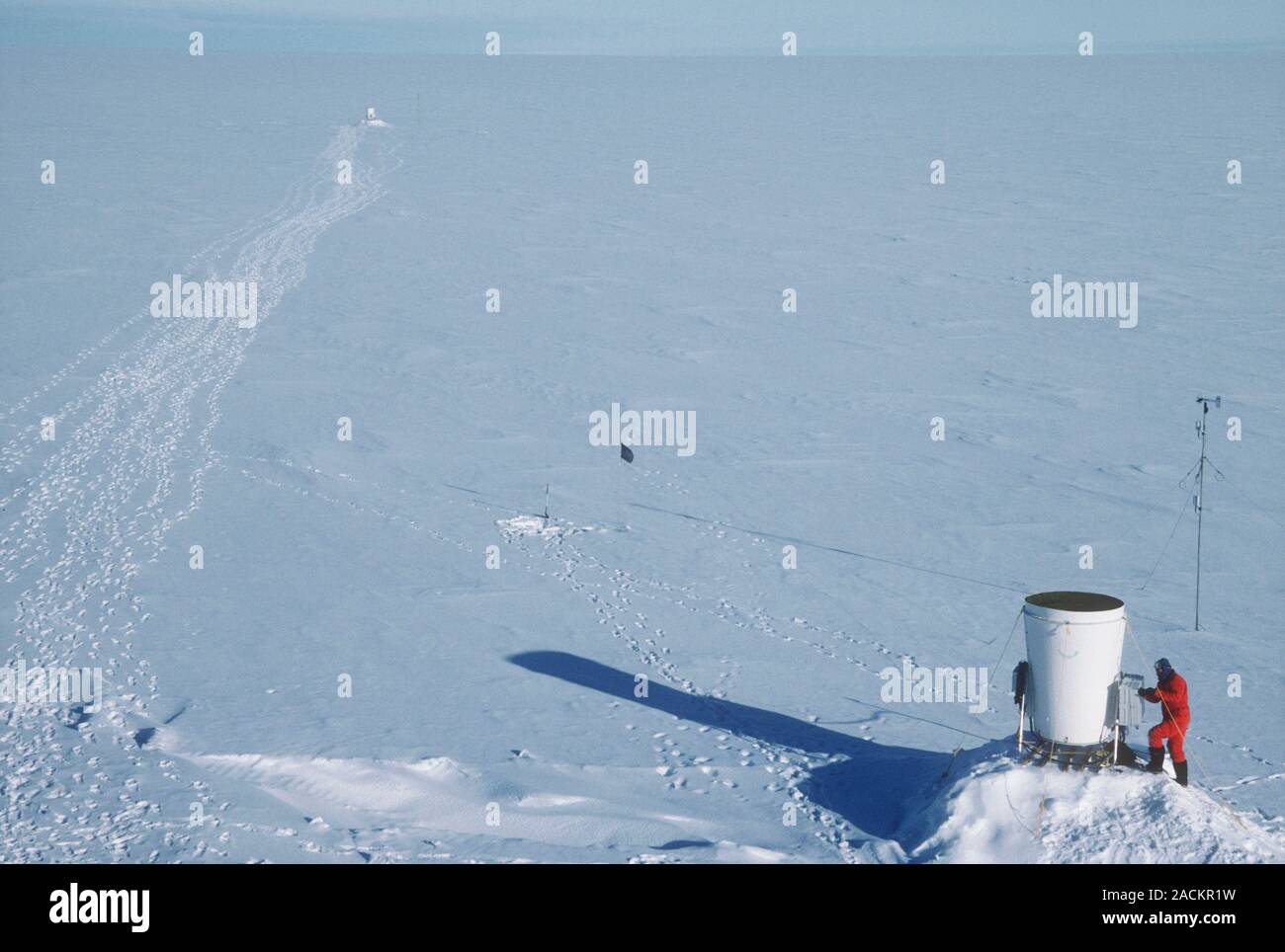 Antarctic research station. Researcher with the SODAR (SOnic Detection ...