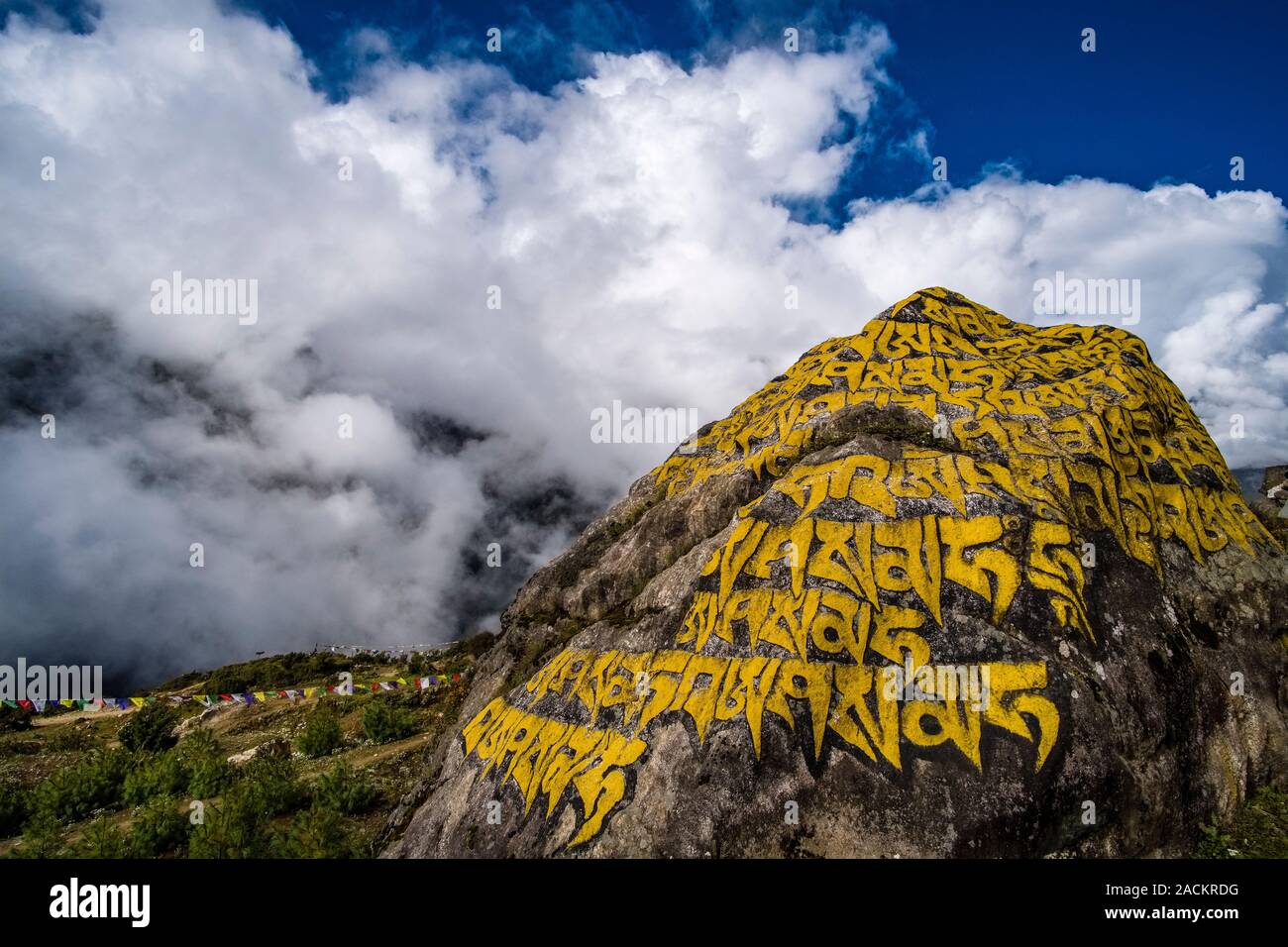 Big Mani Stone with the engraved tibetan mantra Om Mani Padme hum, Mt ...