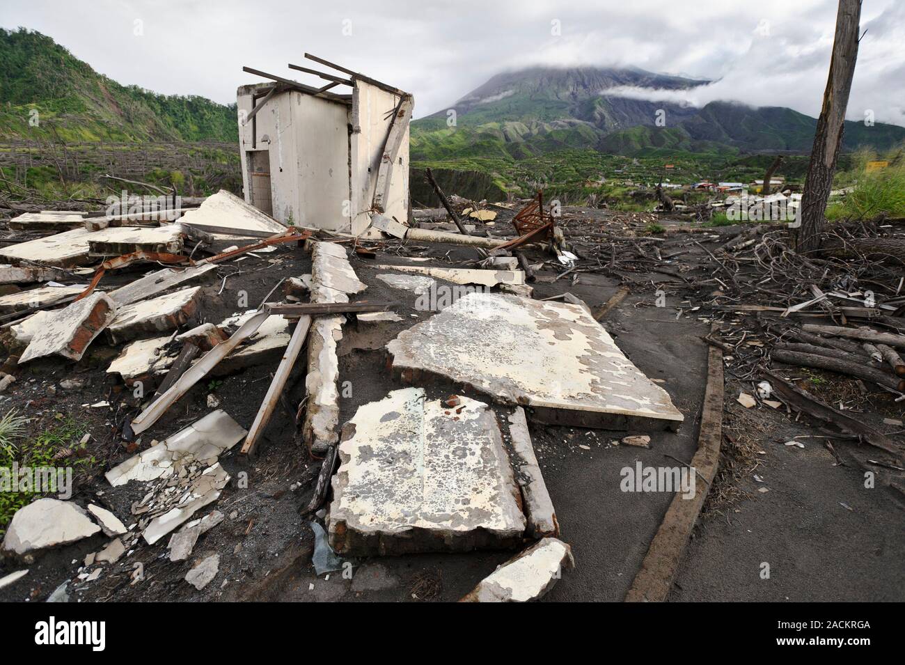 Volcanic destruction. Building destroyed in a pyroclastic flow from the ...