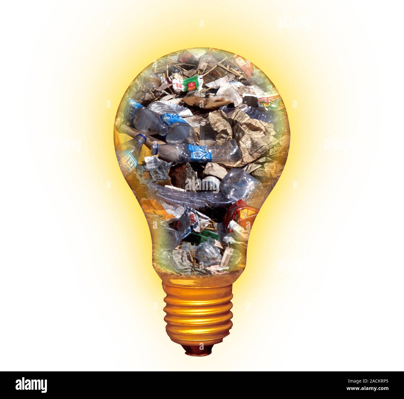 Electrical power. Conceptual image of household waste within a glowing ...