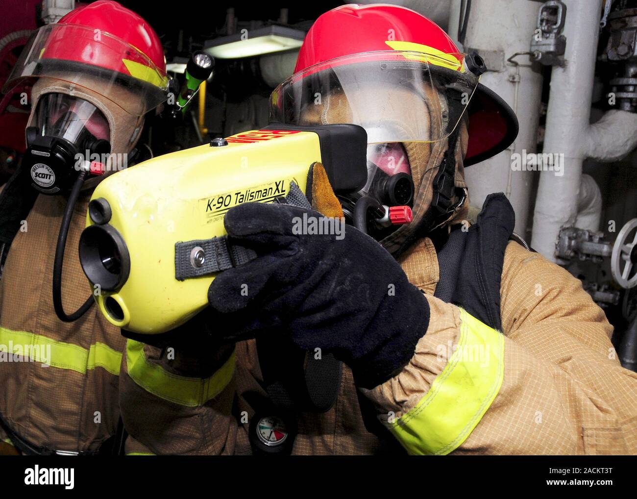 Thermal imaging camera being used to asses a simulated fire during ...