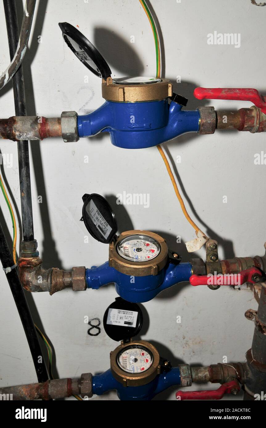 Water meter and pipes Stock Photo - Alamy