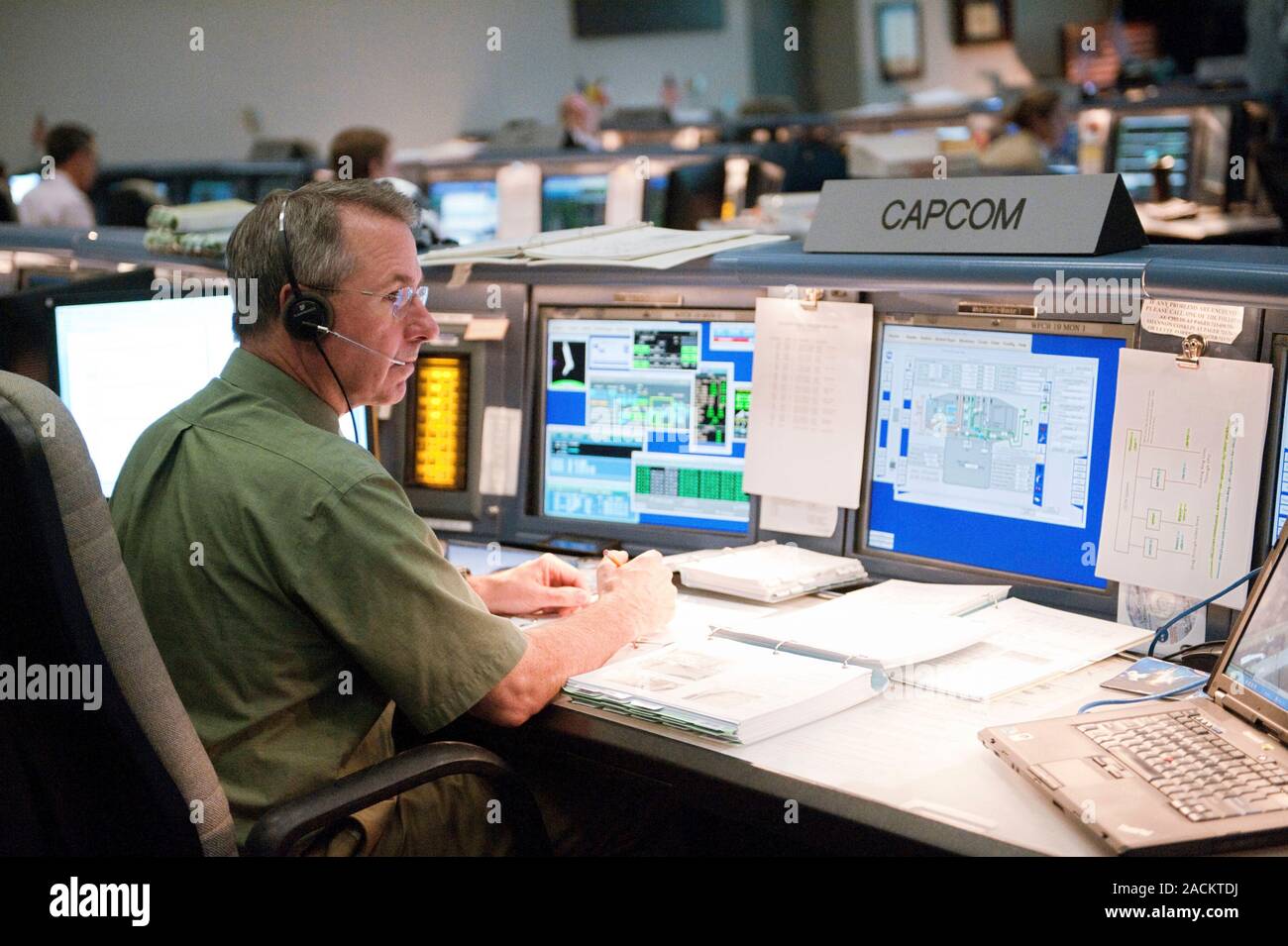 Space Shuttle final flight. NASA flight controllers in the space ...