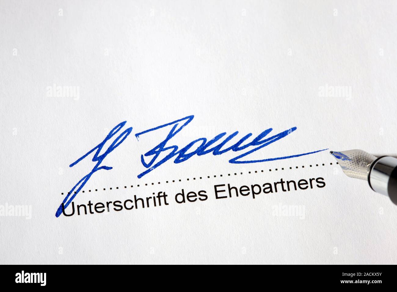 Signature of a spouse Stock Photo - Alamy