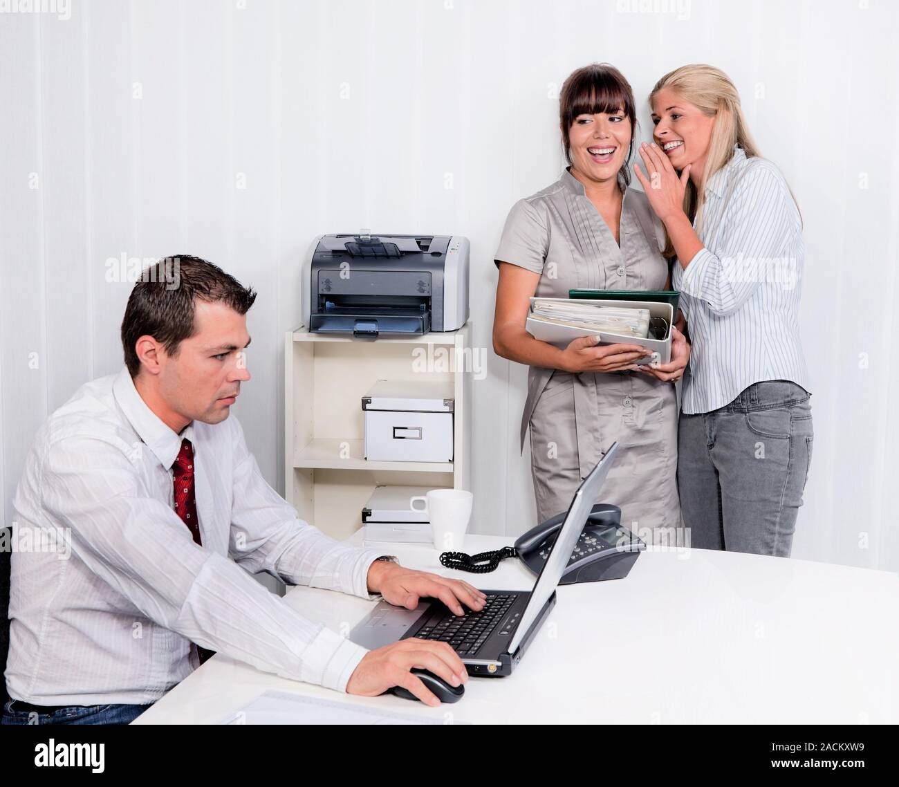 Mobbing at work in the office Stock Photo - Alamy