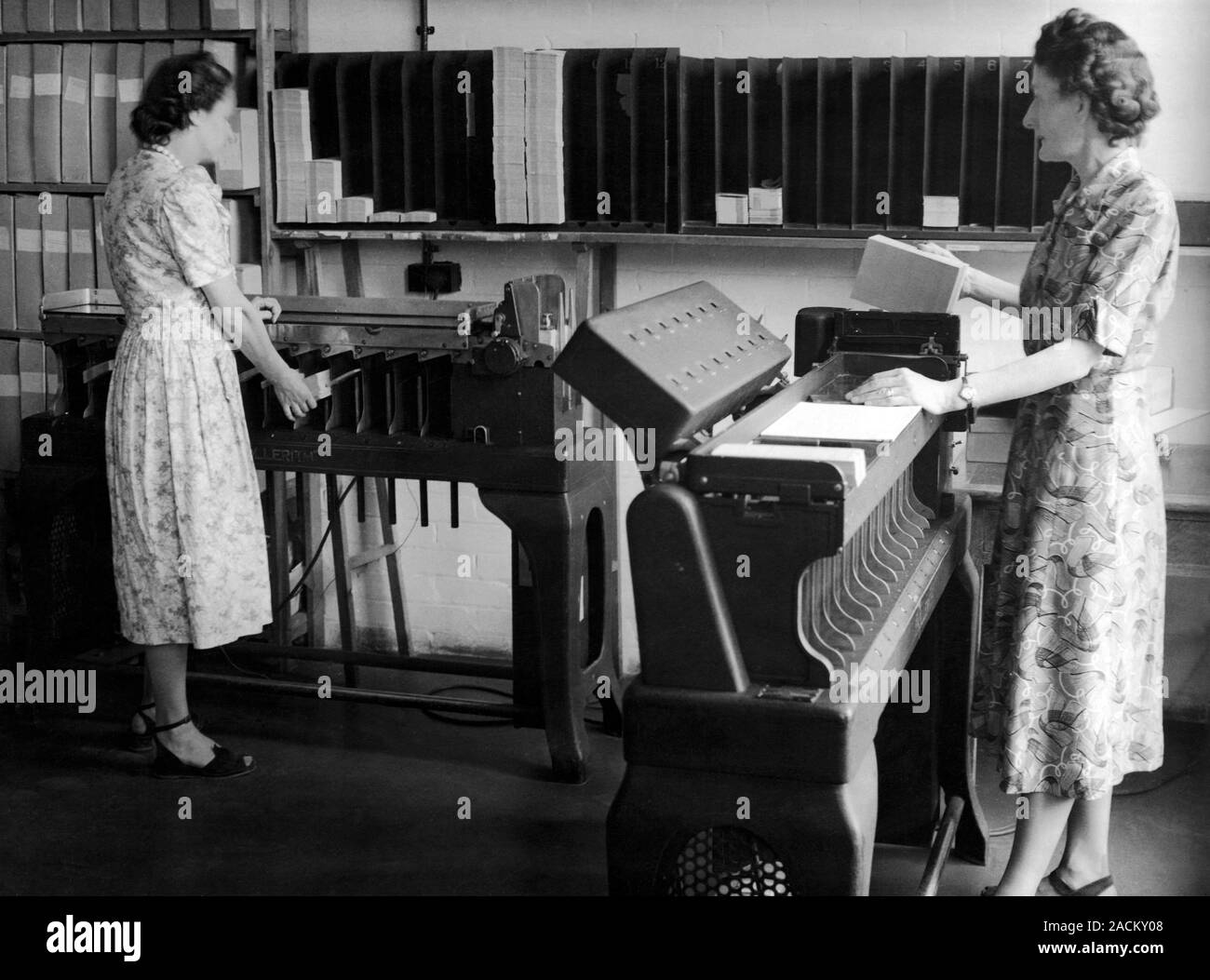 Met Office tabulating machines. Met Office employees sorting punched ...