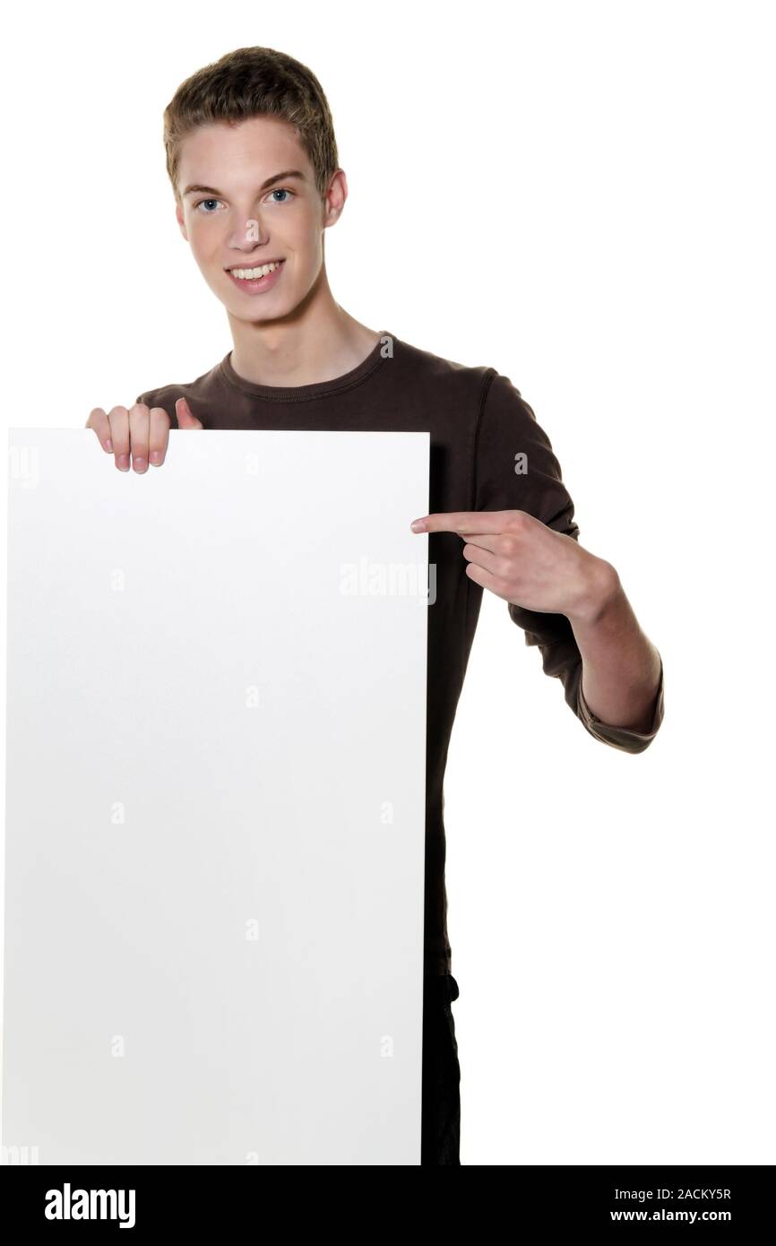 Young man with empty poster Stock Photo - Alamy