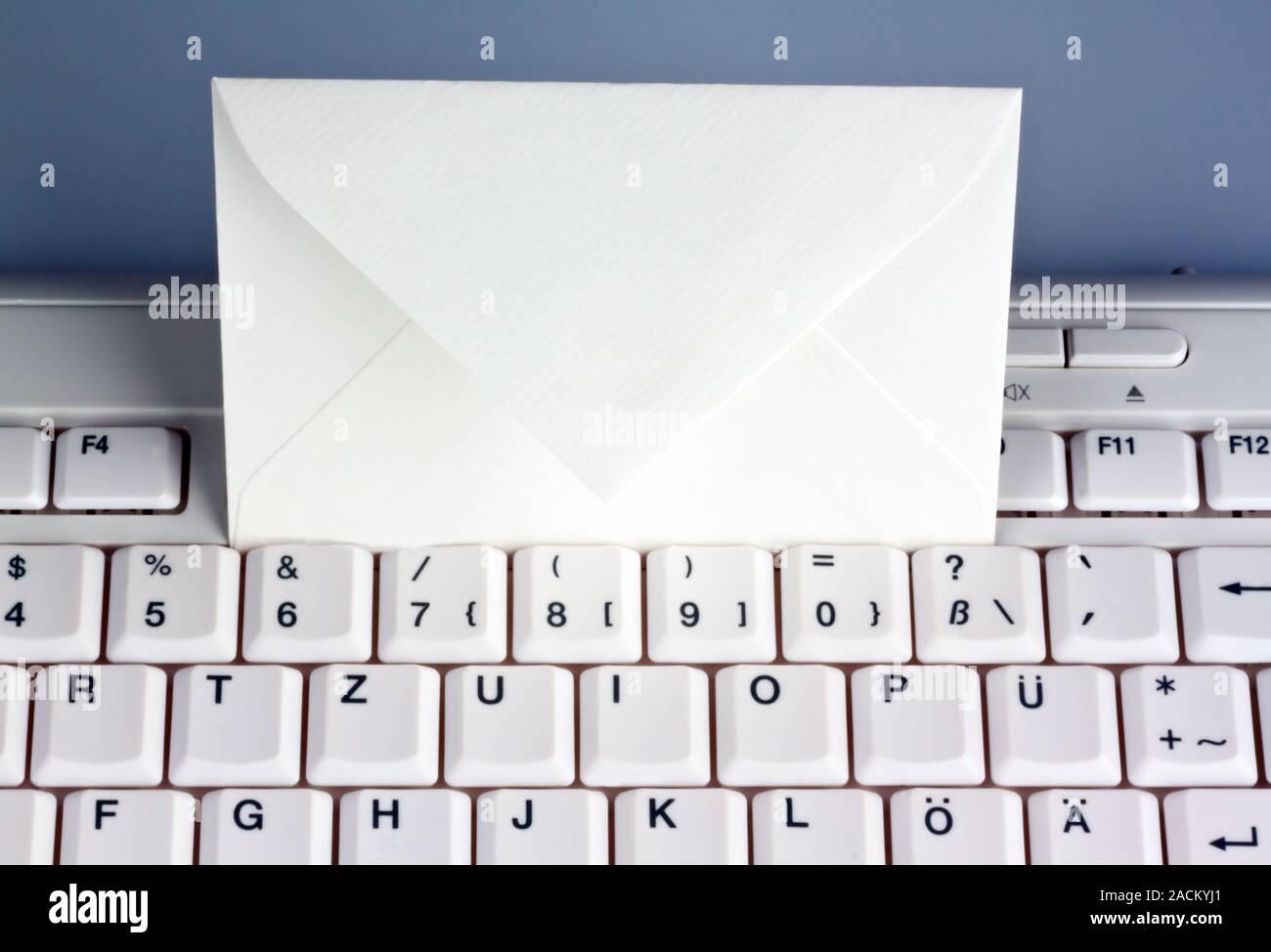 Computer keyboard and envelope. E-mail Stock Photo - Alamy