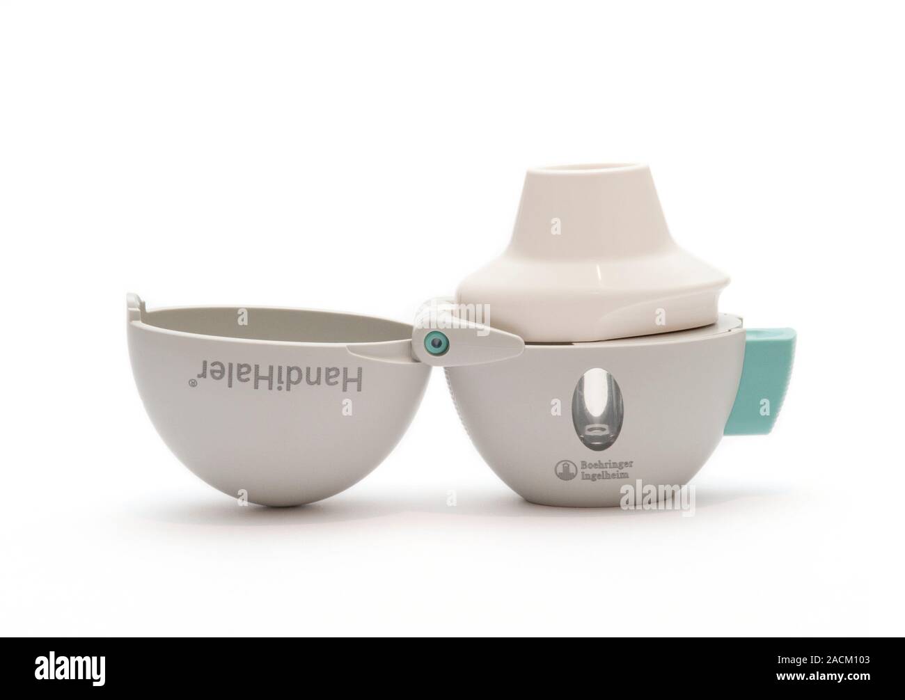 HandiHaler (open position), a hand-held disposable asthma inhaler into ...