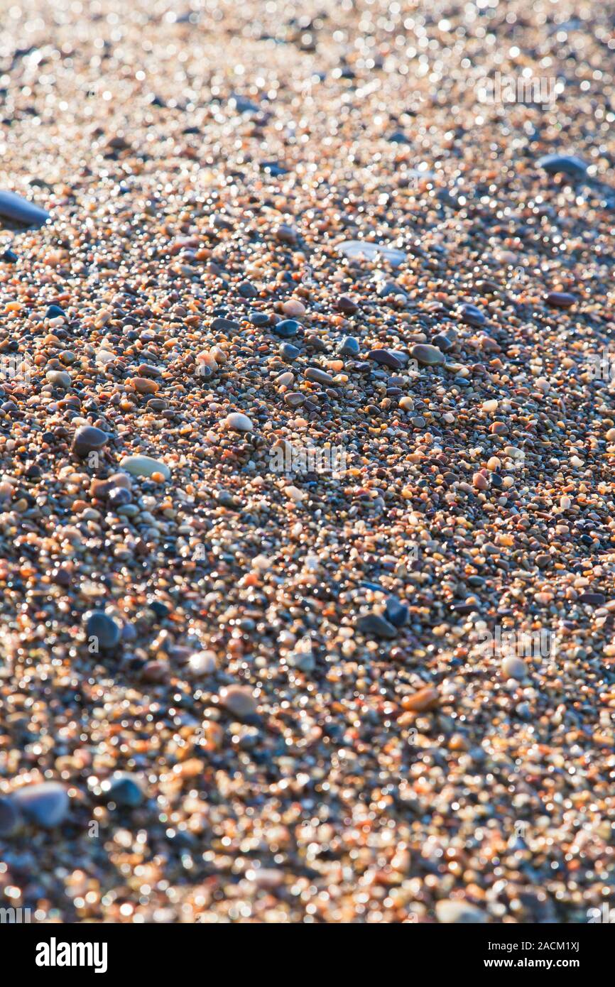 Beach shingle. These stones and pebbles have been formed by erosion due ...