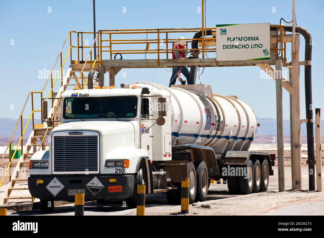 Lithium production. Tanker being loaded with lithium chloride solution ...