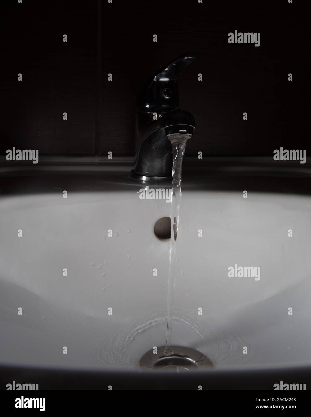 Water running down the drain Stock Photo - Alamy