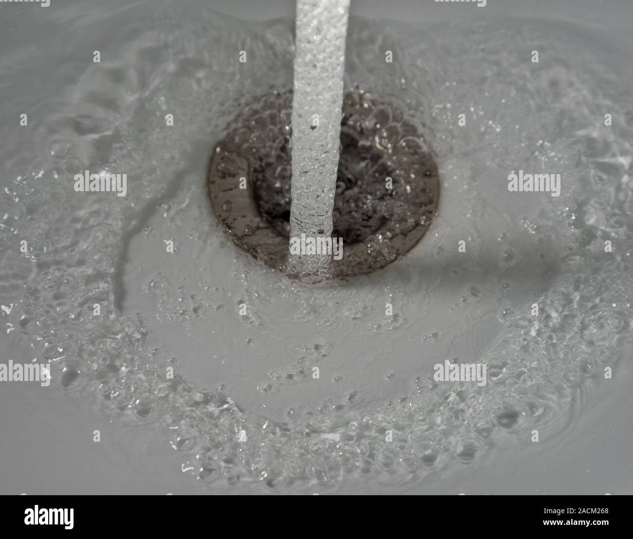 Water running down the drain Stock Photo - Alamy