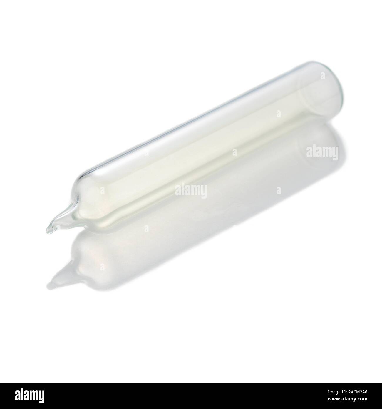 Chlorine. Vial containing a sample of chlorine (Cl) gas. Chlorine has ...