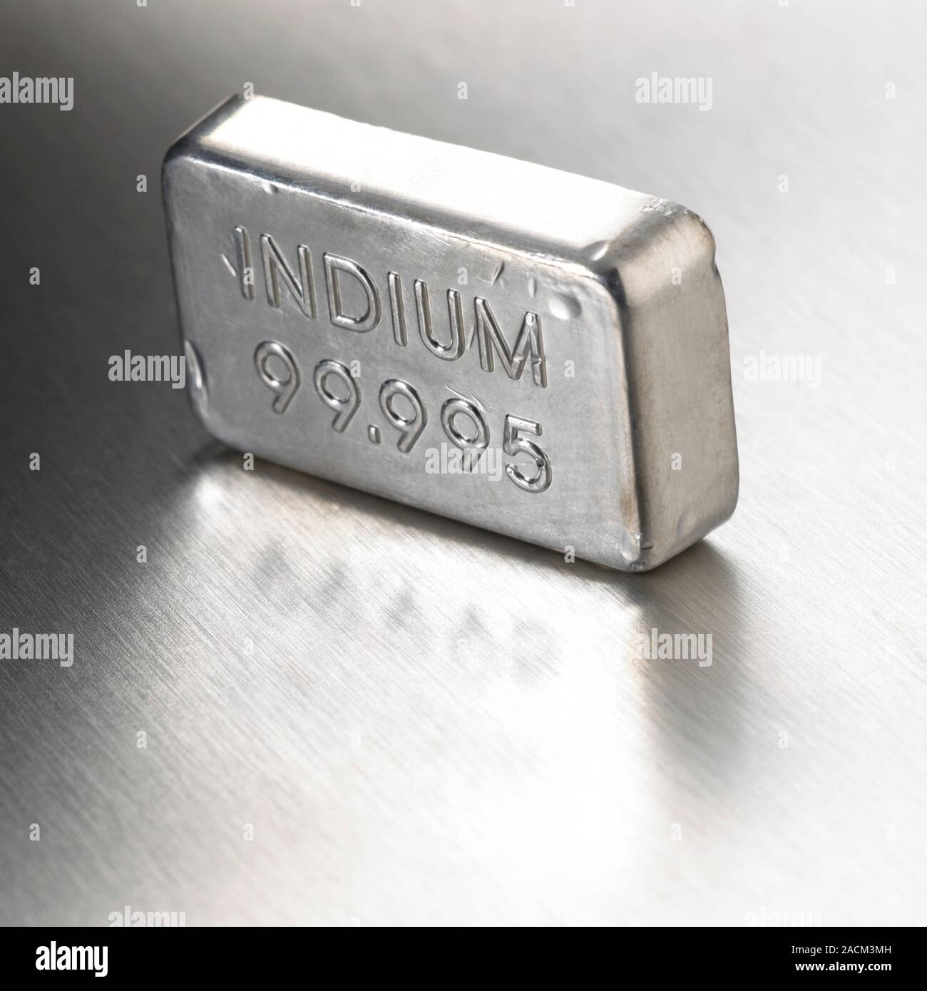 Indium. Bar of the post-transition metal Indium (In). Indium is a rare ...