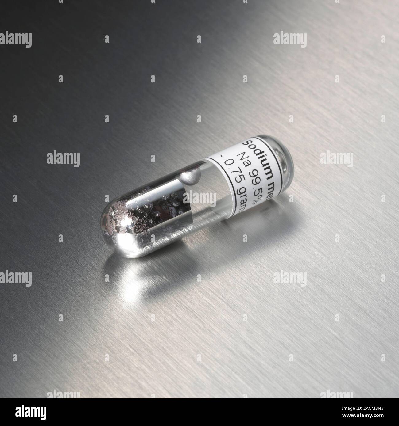 Sodium. Vial containing a sample of the alkali metal sodium (Na ...