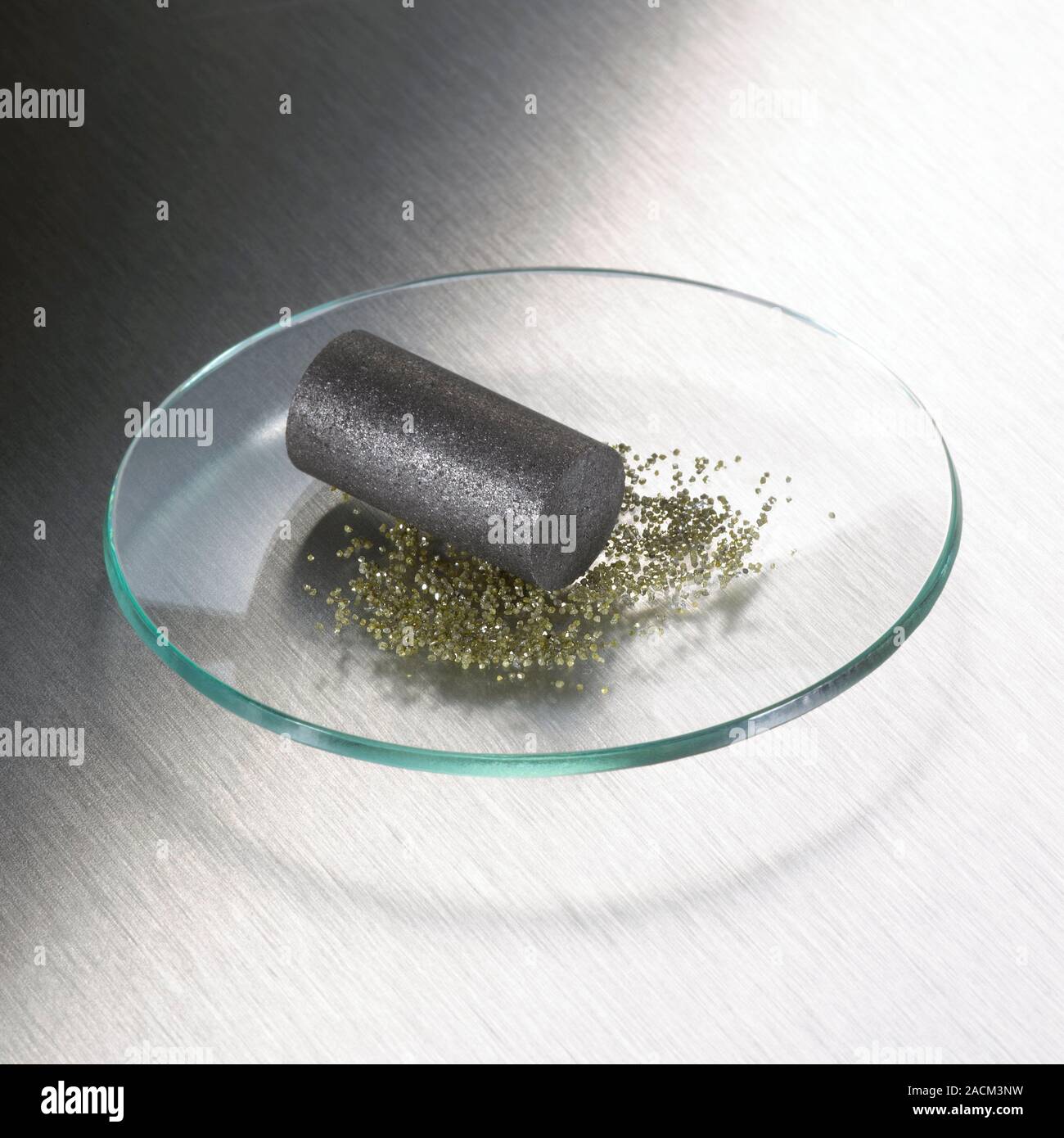 Carbon. Sample of carbon in two different forms, a graphite rod and ...