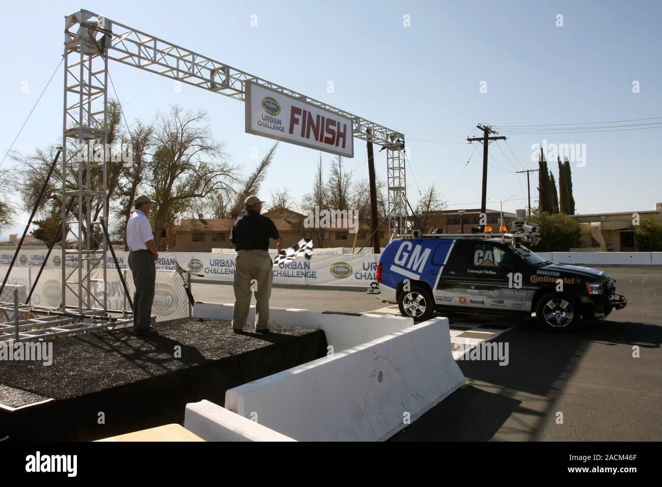 Autonomous vehicle crossing the finishing line of the 2007 DARPA Urban ...